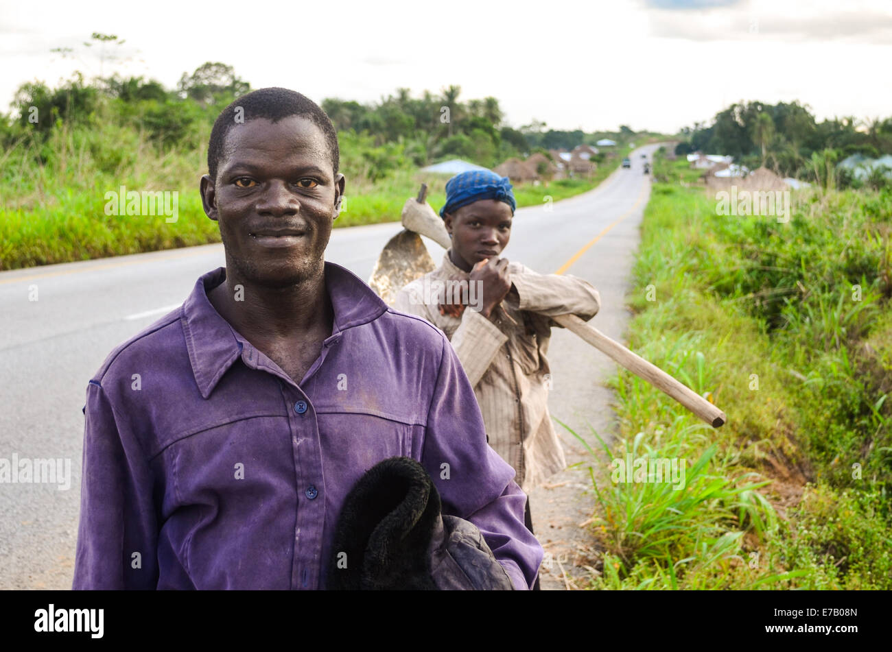 Two men after work in Sierra Leone Stock Photo - Alamy