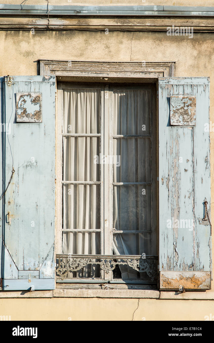 medieval window of half-timbered houses in a row in the old town of ...