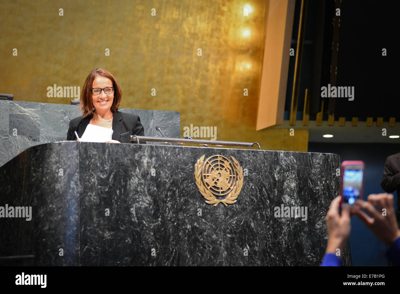 New York, USA. 11th Sep, 2014. A journalist has her picture taken at ...