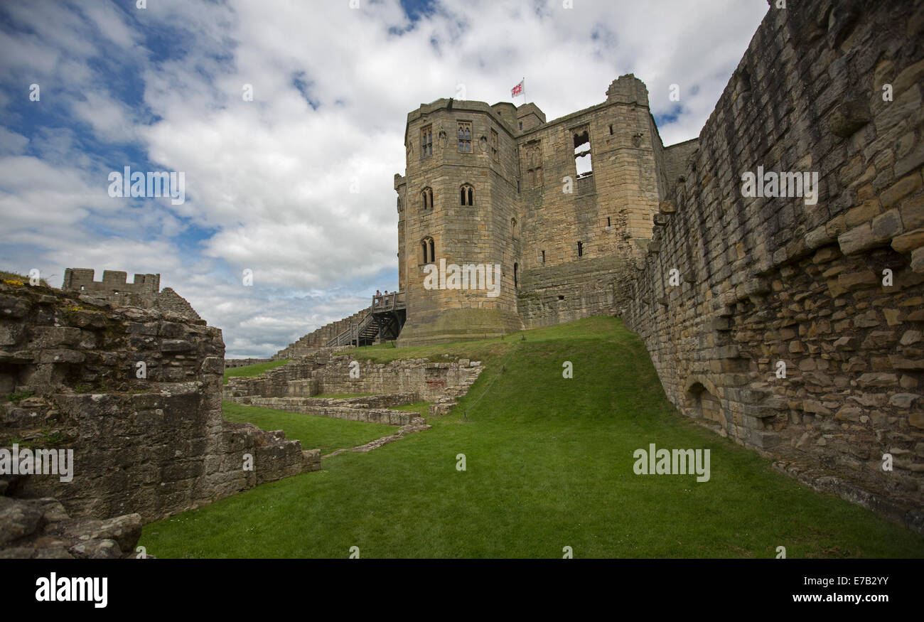 View of extensive ruins of historic 12th century castle with emerald ...