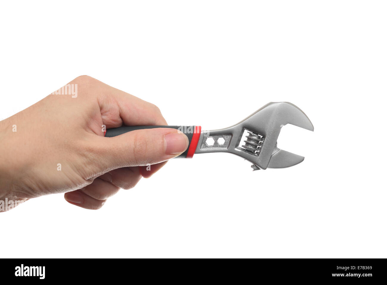 Adjustable Wrench in hand against white background Stock Photo - Alamy