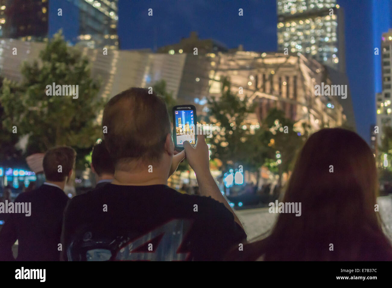 New York, NY, USA. 11th Sep, 2014. People gather at the 9/11 Memorial ...