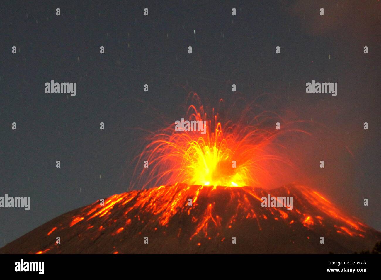 Jakarta, Indonesia. 11th Sep, 2014. Hot lava explodes from the crater ...