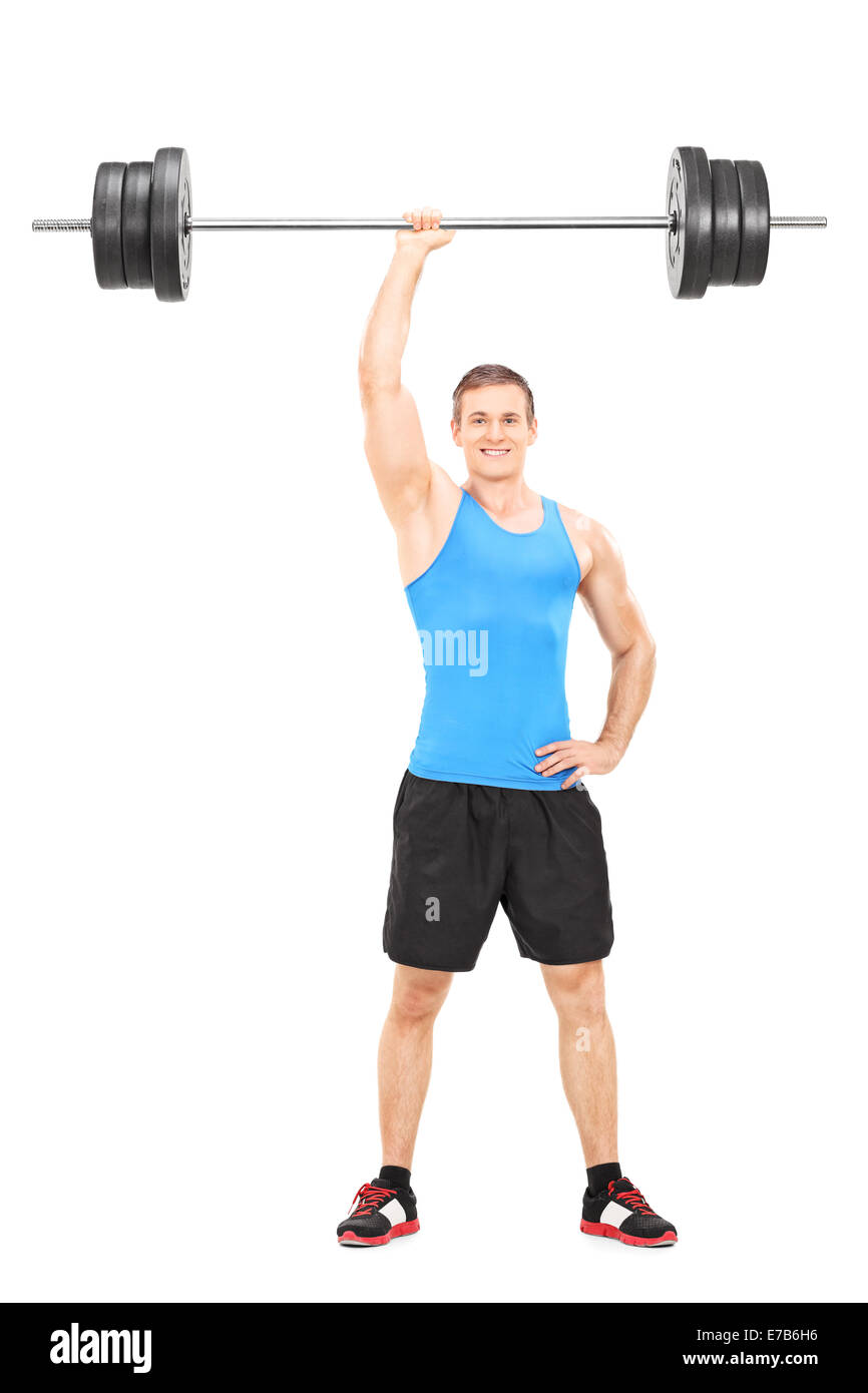 Full length portrait of a strong athlete holding a weight in one hand ...