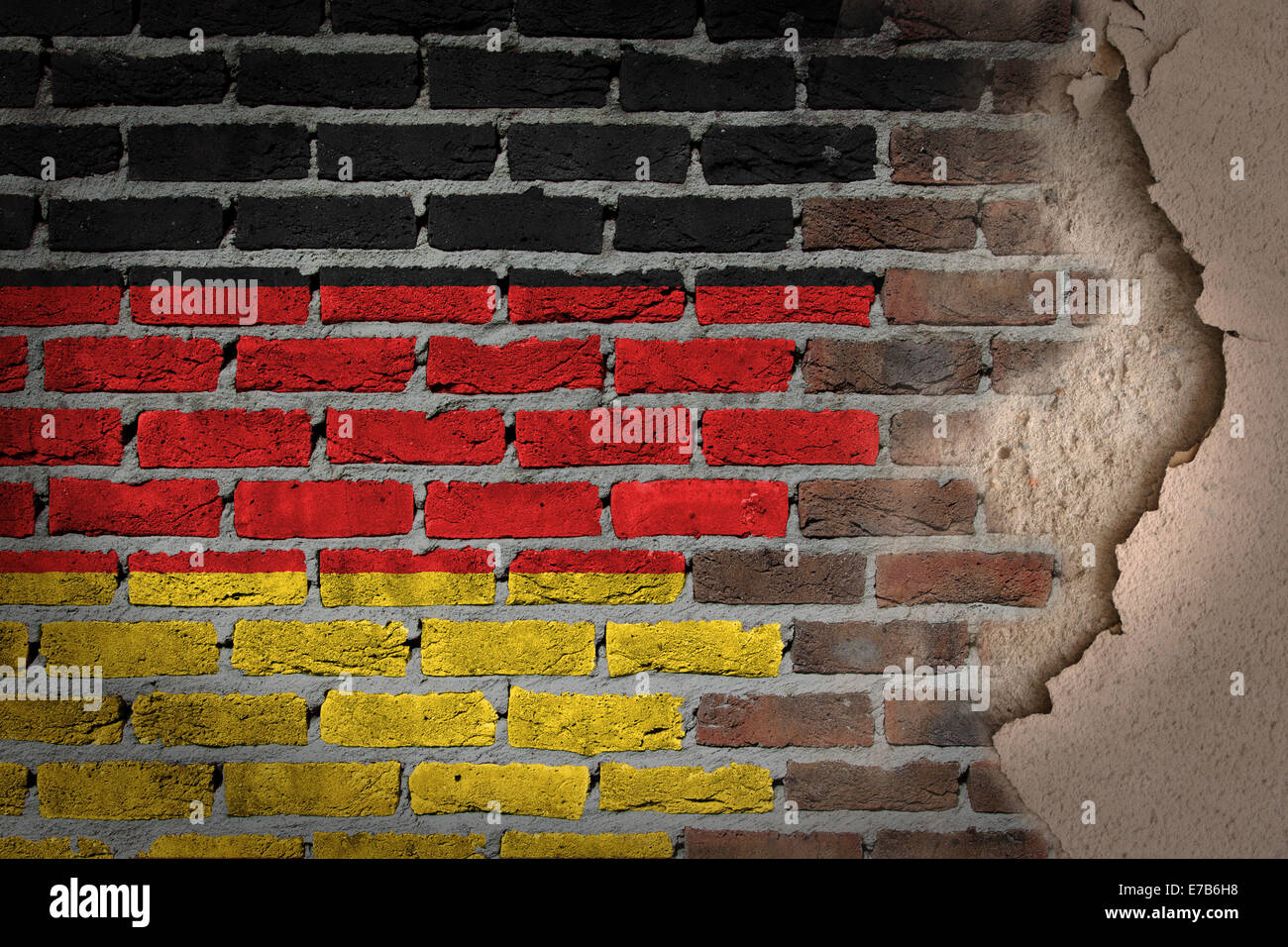 Dark brick wall texture with plaster - flag painted on wall - Germany ...