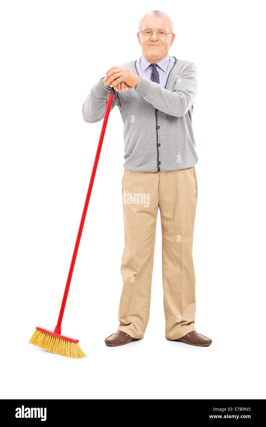 Person holding a broom hi-res stock photography and images - Alamy