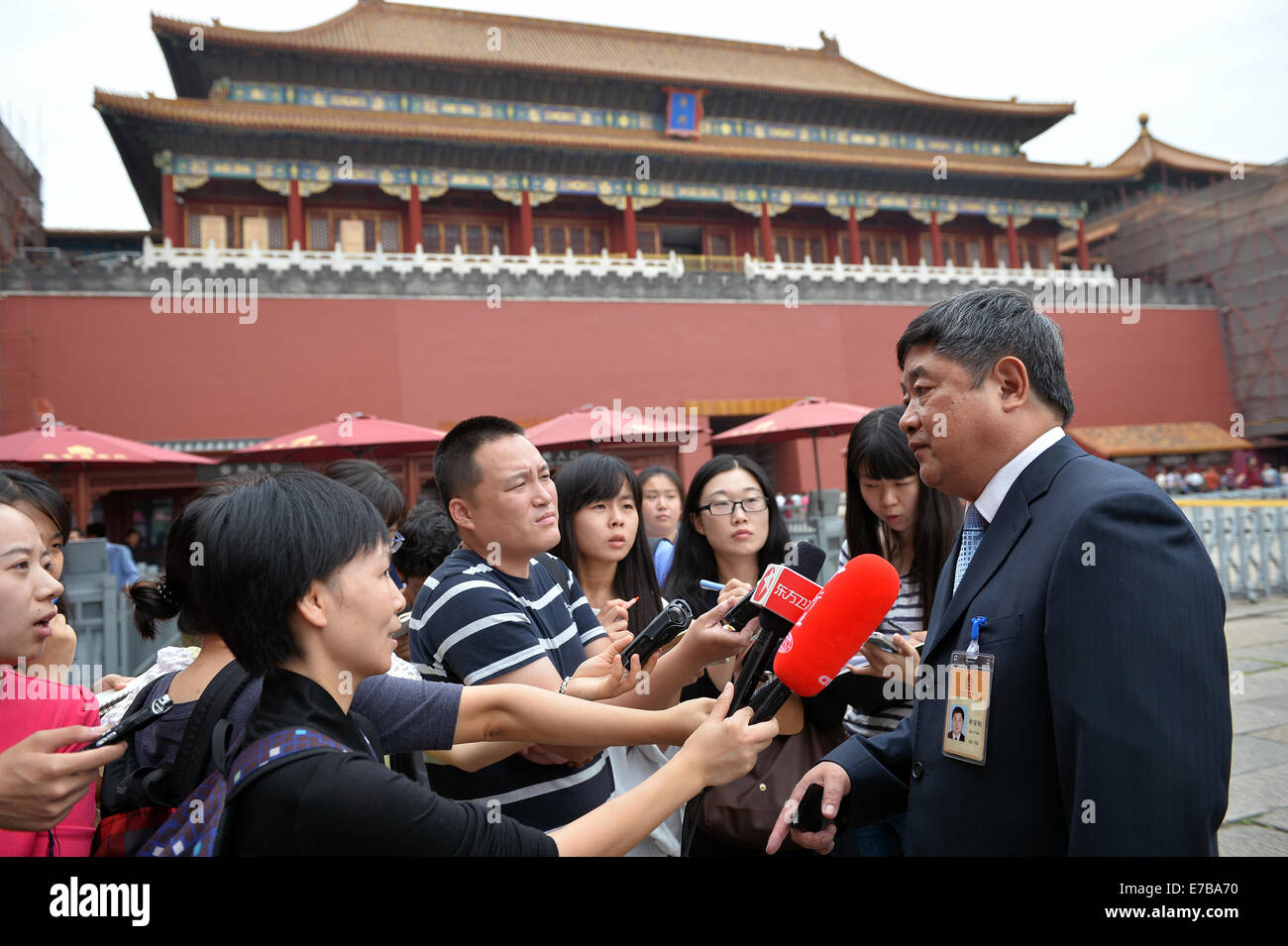 Beijing, China. 12th Sep, 2014. Shan Jixiang (R), curator of the Palace ...