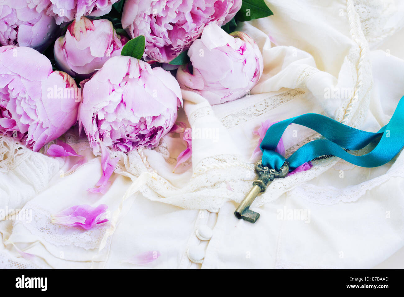 Key with peony flowers Stock Photo - Alamy