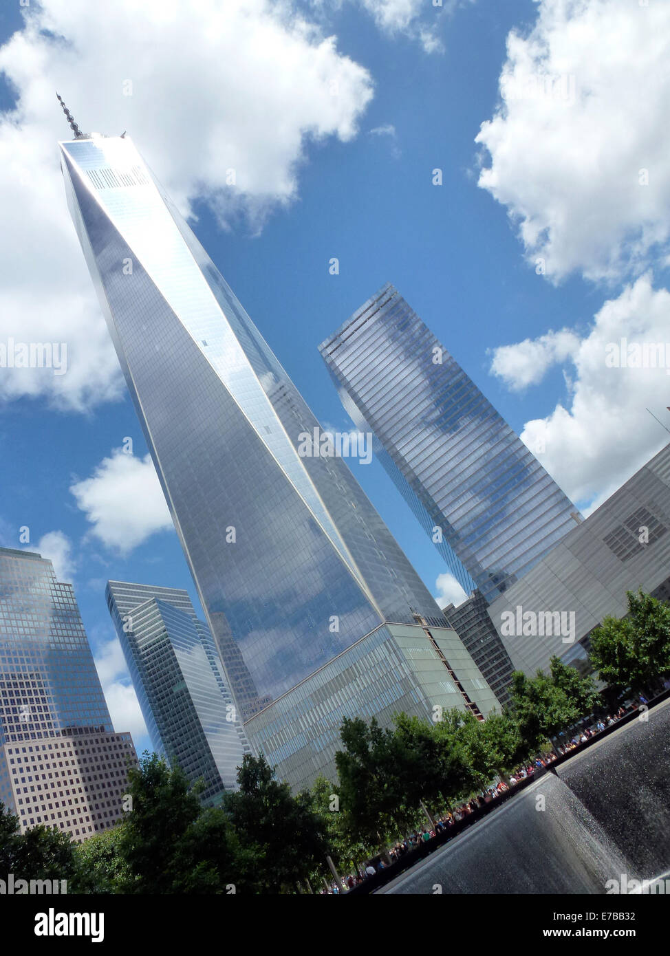 Clouds mirror on the glass facade of the One World Trade Center (1st ...