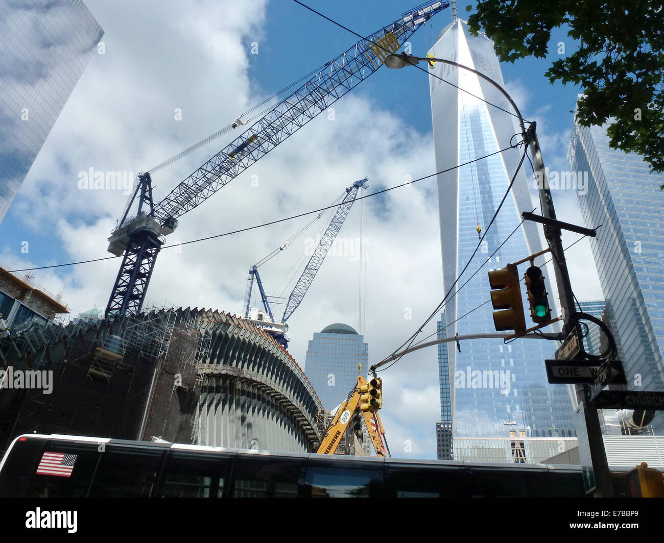 New York, USA. 26th June, 2014. Clouds mirror on the glass facade of ...
