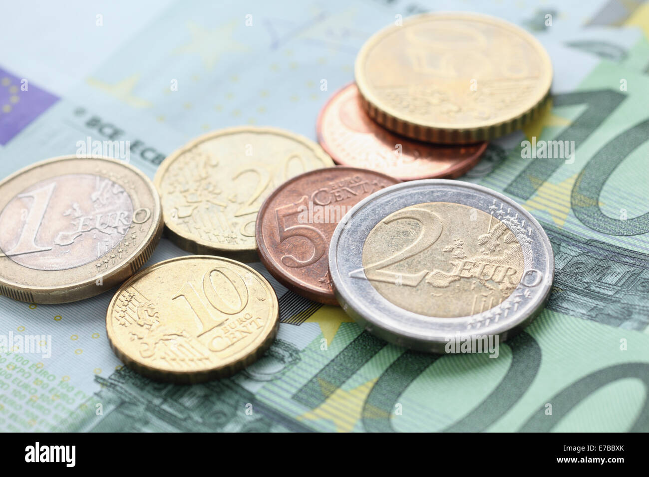 Euro notes and coins. Close-up Stock Photo - Alamy