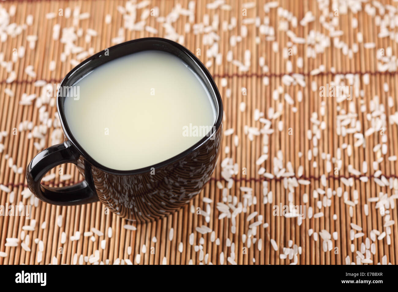 Rice Drink in a black cup Stock Photo - Alamy