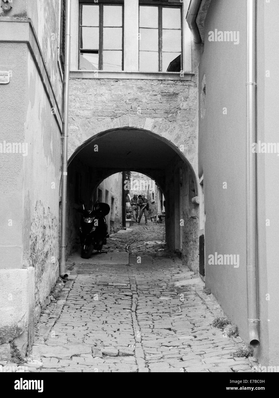 Passage between houses in Groznjan (Grisignana), Croatia Stock Photo ...