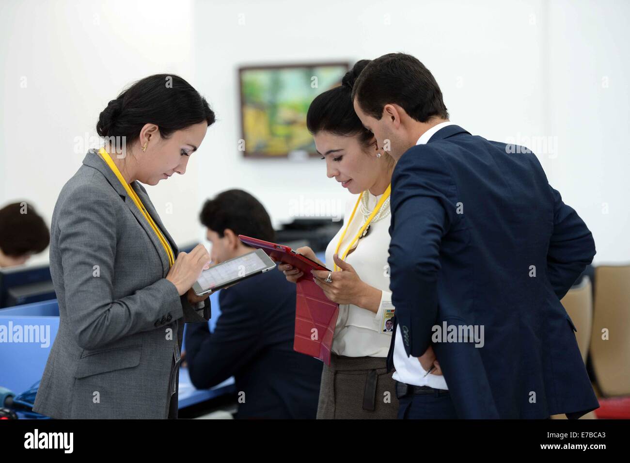 Dushanbe, Tajikistan. 12th Sep, 2014. Journalists work at the press ...