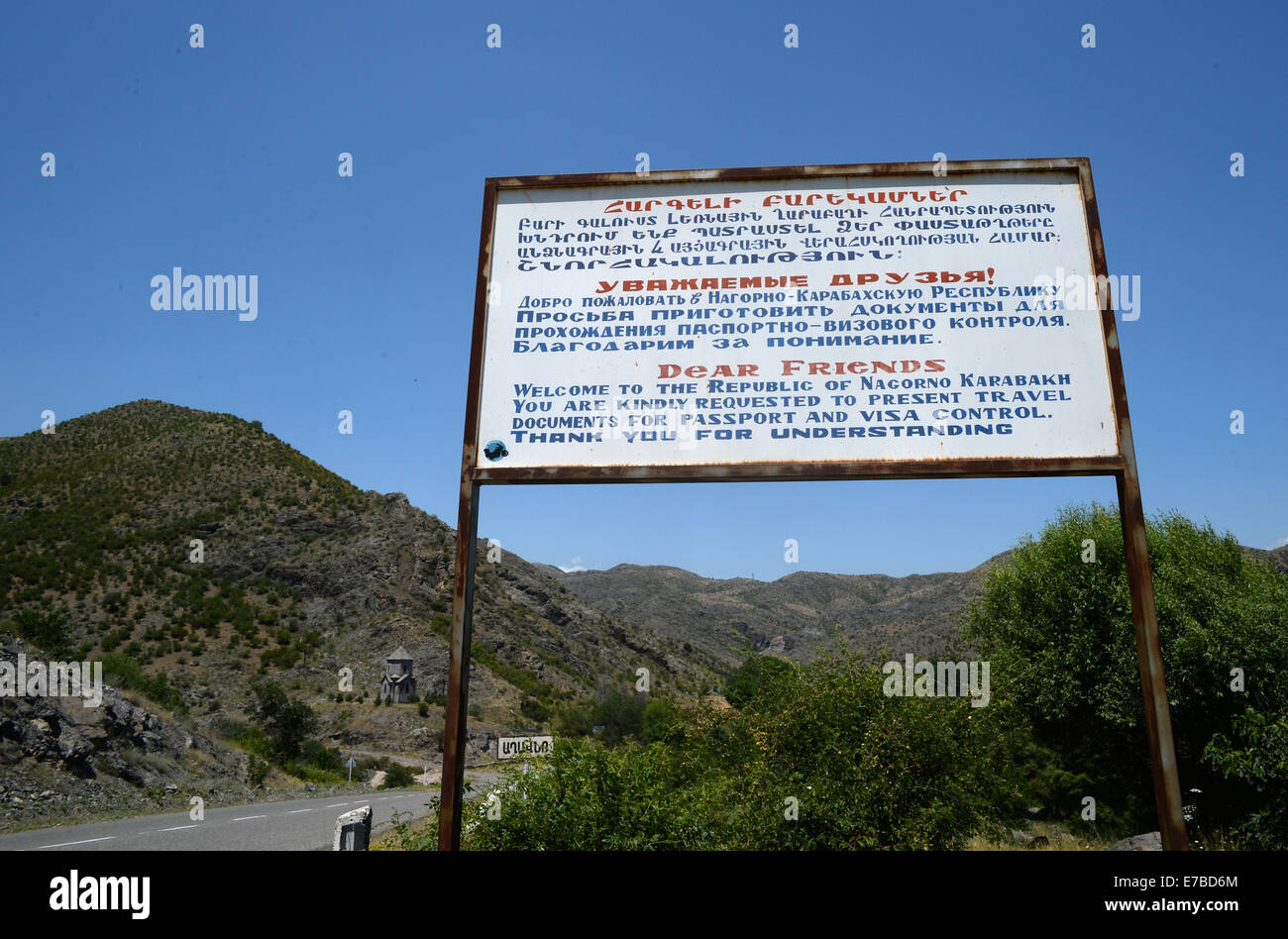 A sign in Armenian, Russian and English politely informs of a passport ...