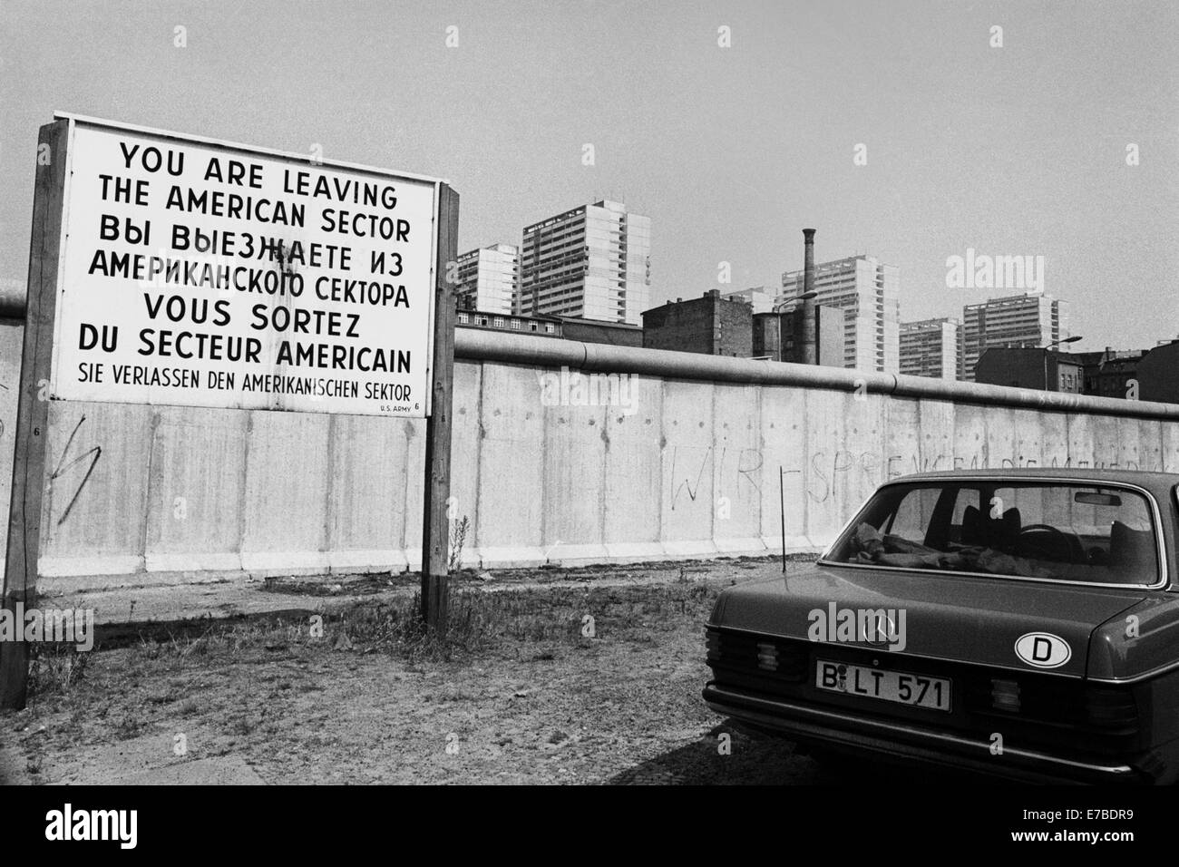 the Berlin Wall at the border crossing Checkpoint Charlie, in the ...