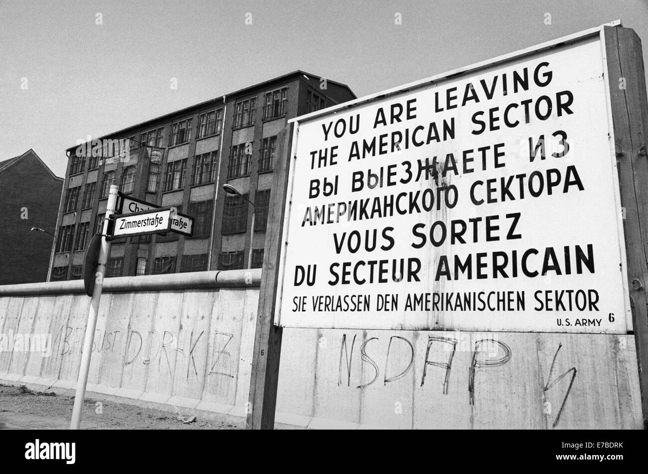 the Berlin Wall at the border crossing Checkpoint Charlie, in the ...
