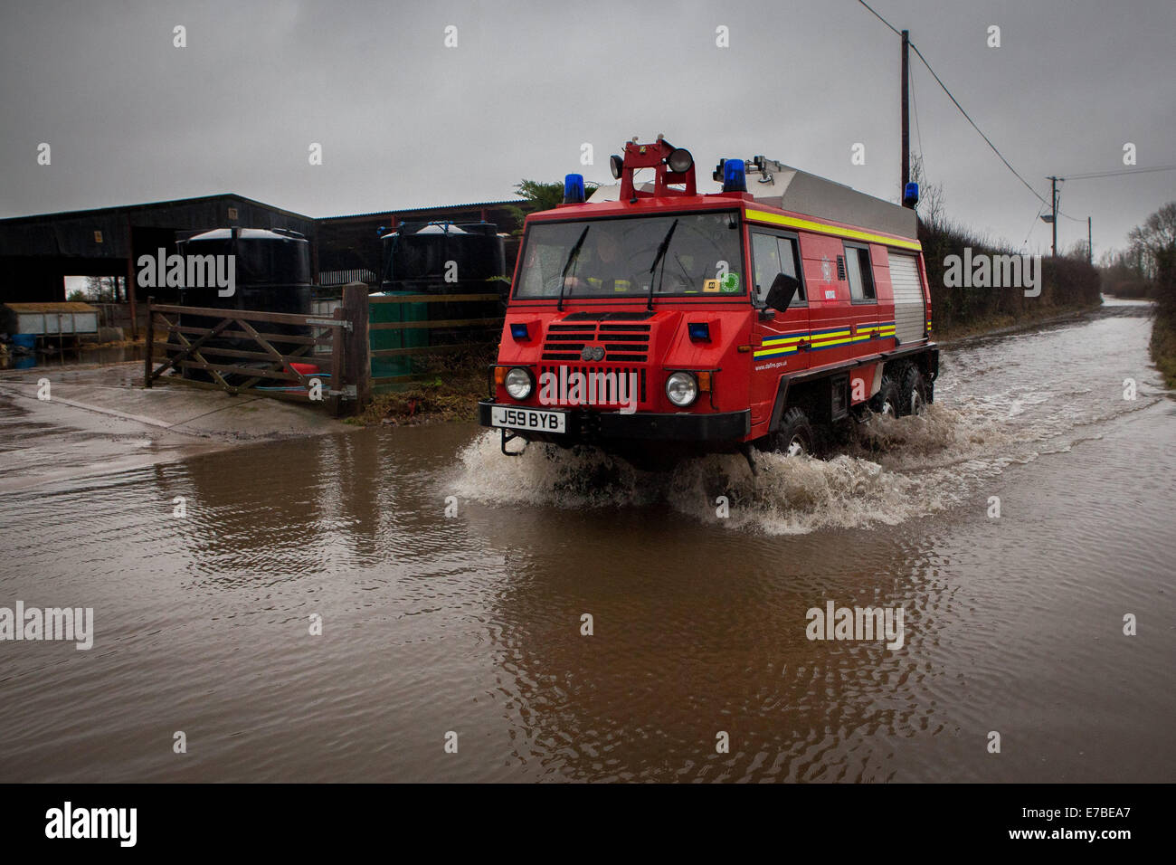 A fire service truck drives through Thorney, Somerset Stock Photo - Alamy