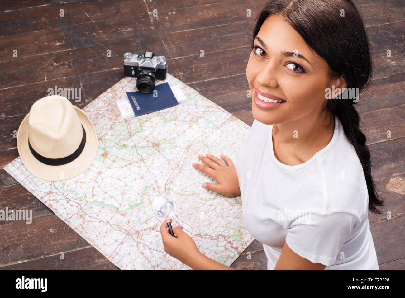 Yiung woman searching a map Stock Photo - Alamy