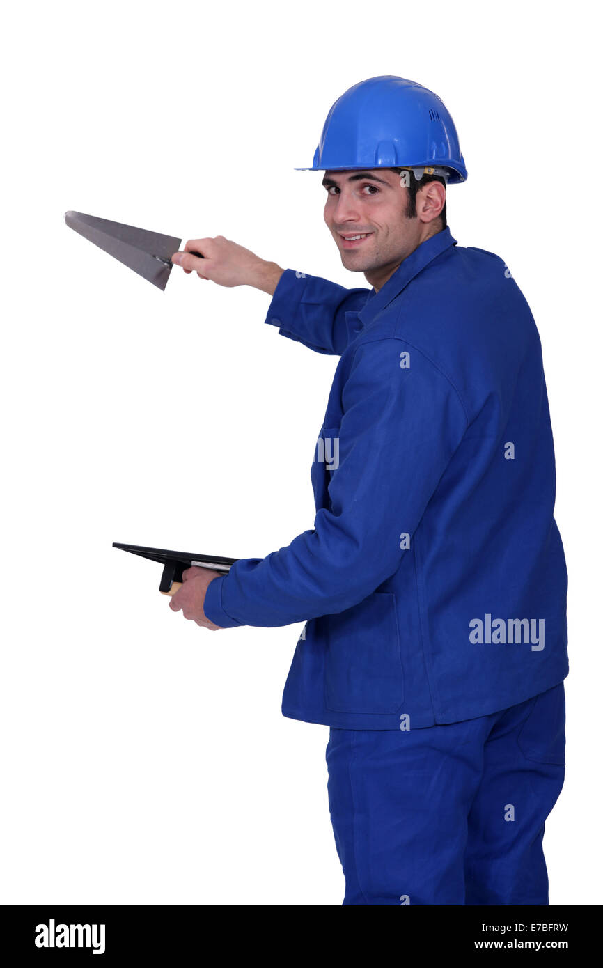 Builder with a trowel Stock Photo - Alamy