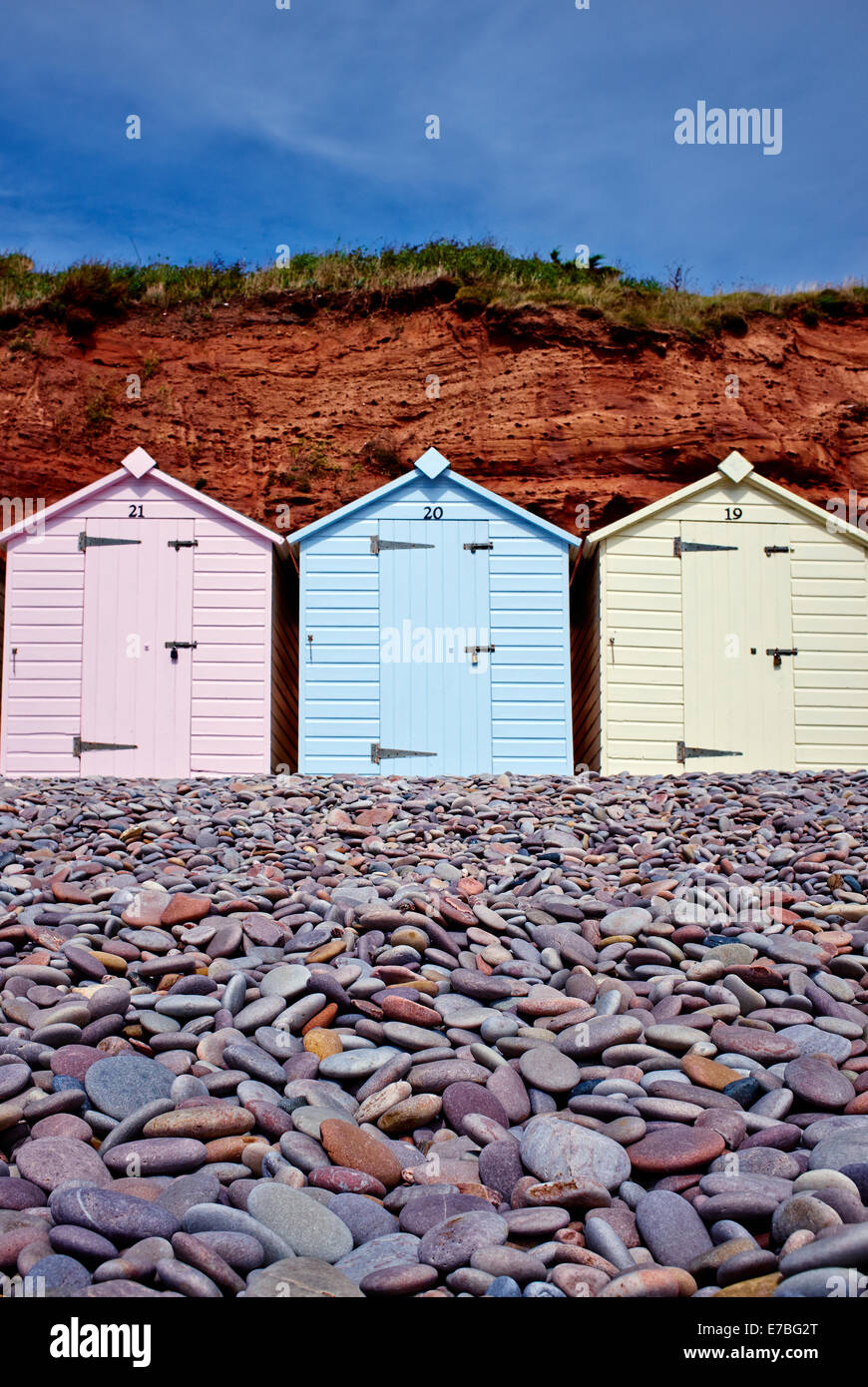 Pastel painted beach huts, English coast, England Stock Photo - Alamy