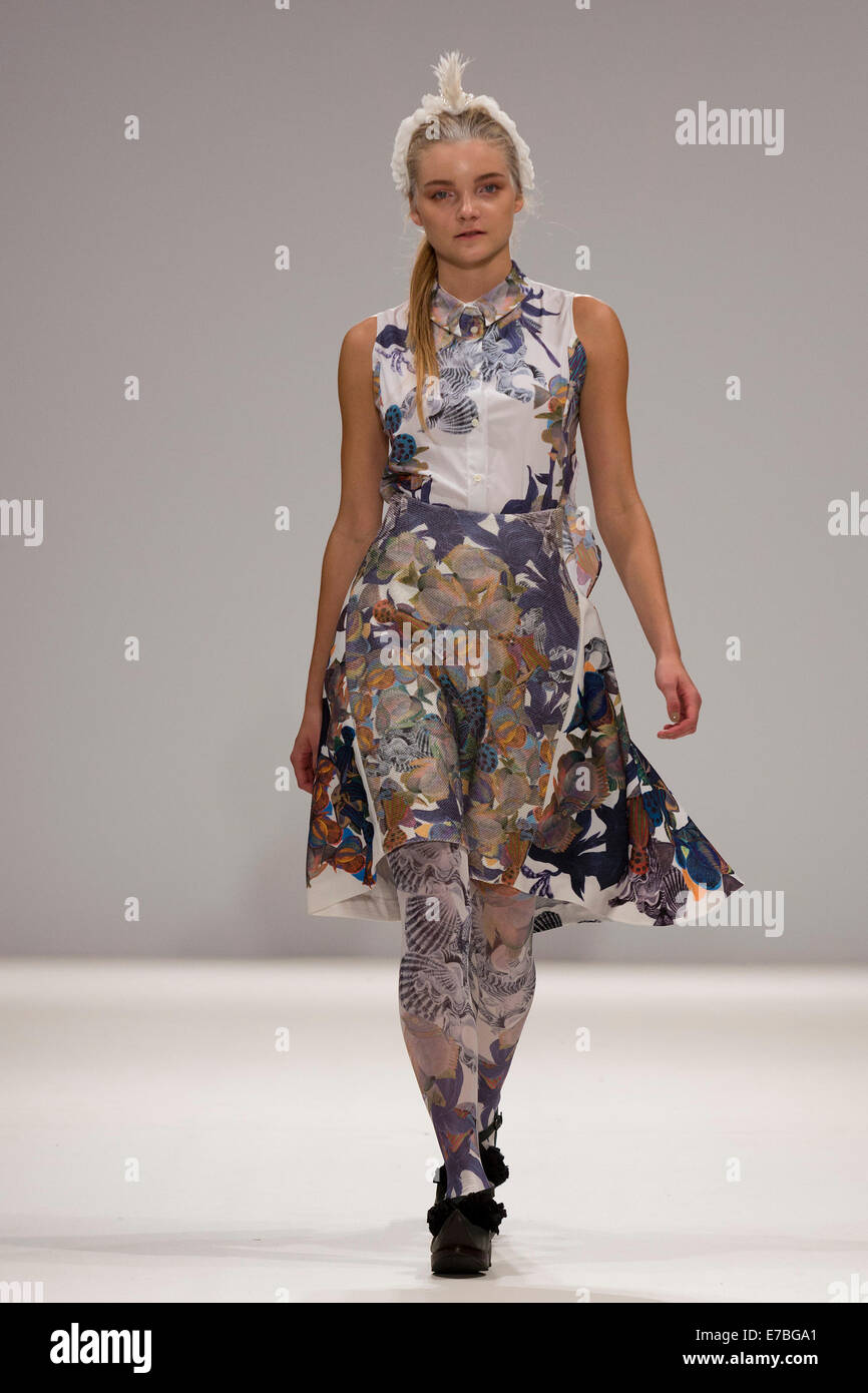 London, UK. 12 September 2014. Collection by Keiko Nishiyama. A model ...