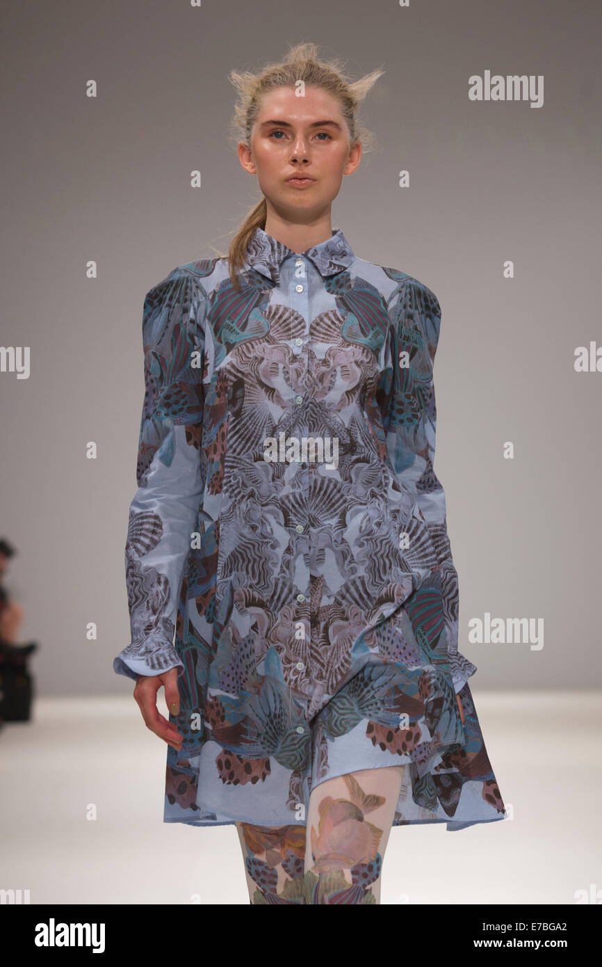 London, UK. 12 September 2014. Collection by Keiko Nishiyama. A model ...