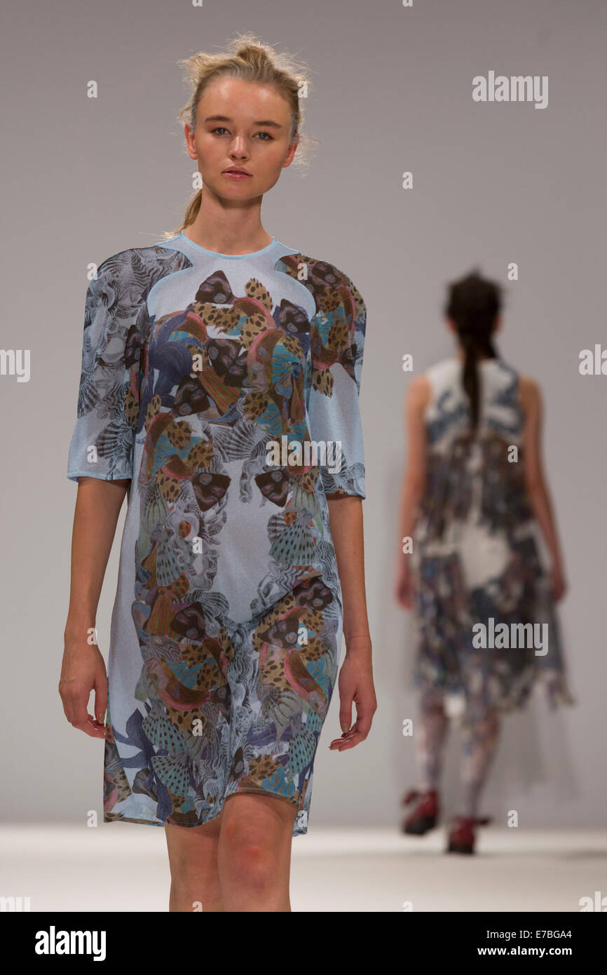 London, UK. 12 September 2014. Collection by Keiko Nishiyama. A model ...
