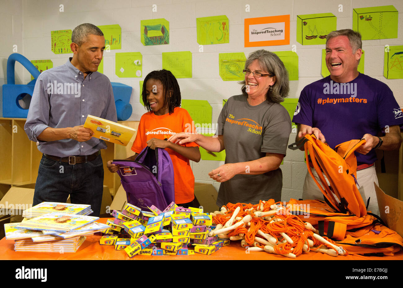 United States President Barack Obama and volunteers take part in a ...