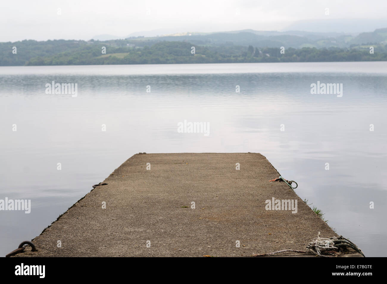 Concrete jetty at a lake Stock Photo - Alamy