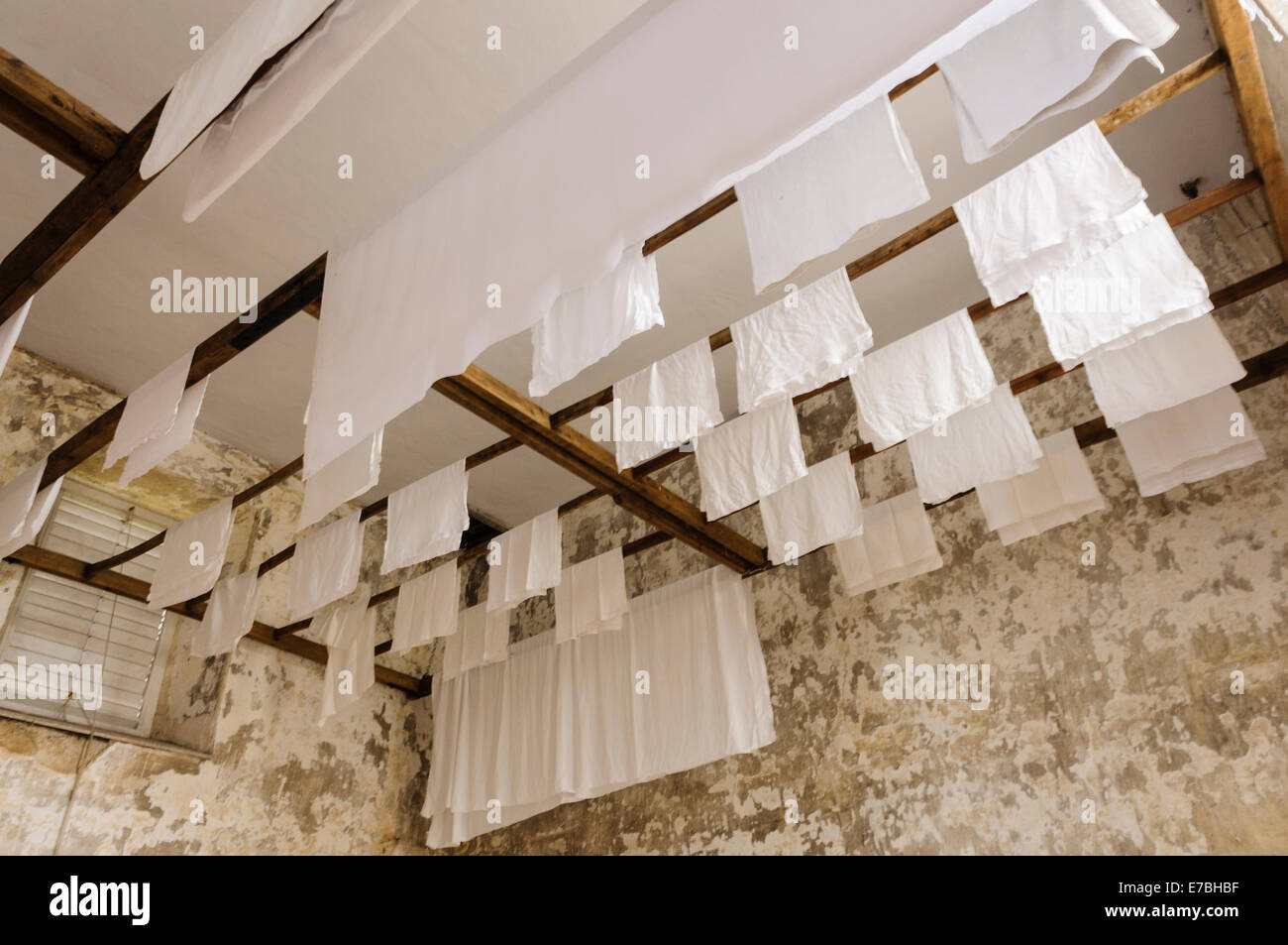 Laundry drying on wooden rails at a laundry room of a traditional ...