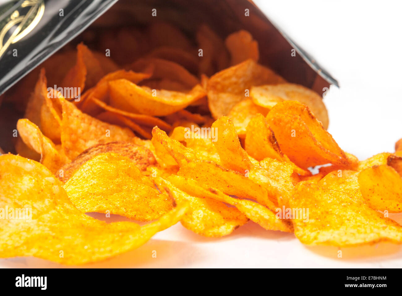 Potato chips in white background Stock Photo - Alamy