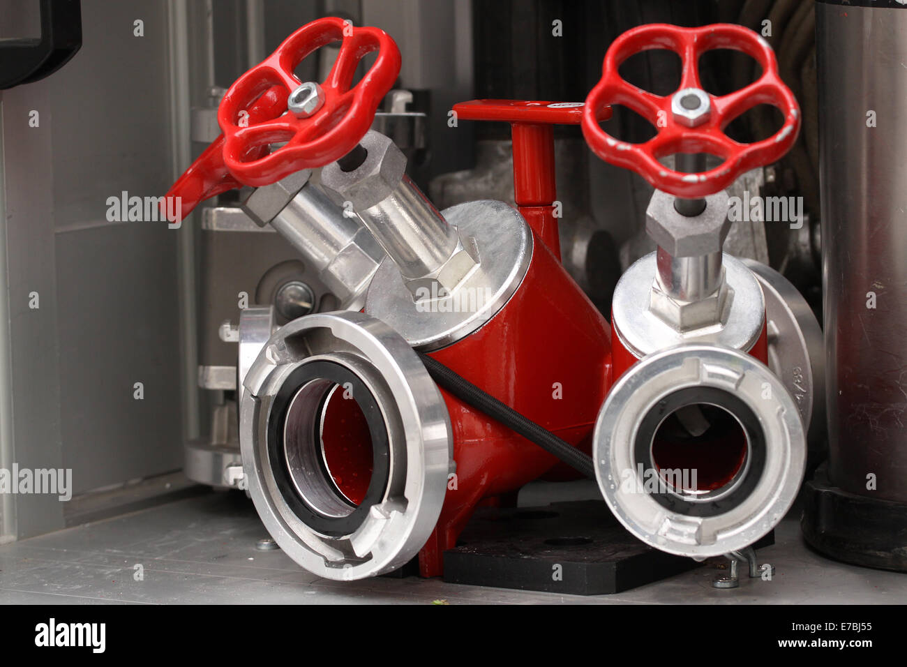 The close-up of hydrant and water hoses Stock Photo - Alamy
