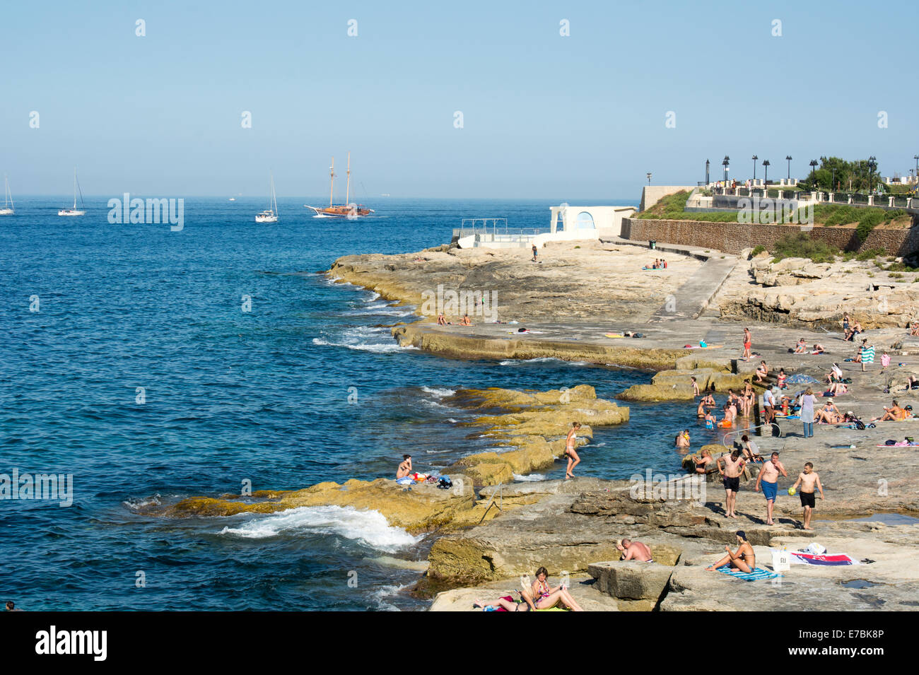 Bathing pools have been cut into the rocks on the Tigne seafront close ...