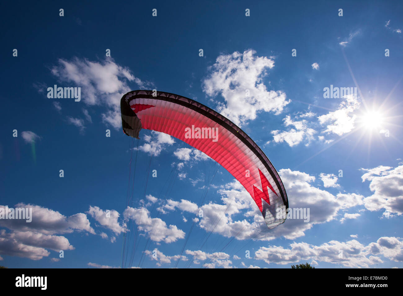 Paragliding paraglider parachute canopy on a cloudy blue sky Stock ...