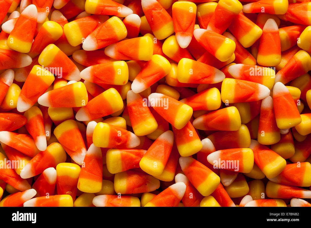 Colorful Candy Corn for Halloween on a Background Stock Photo - Alamy