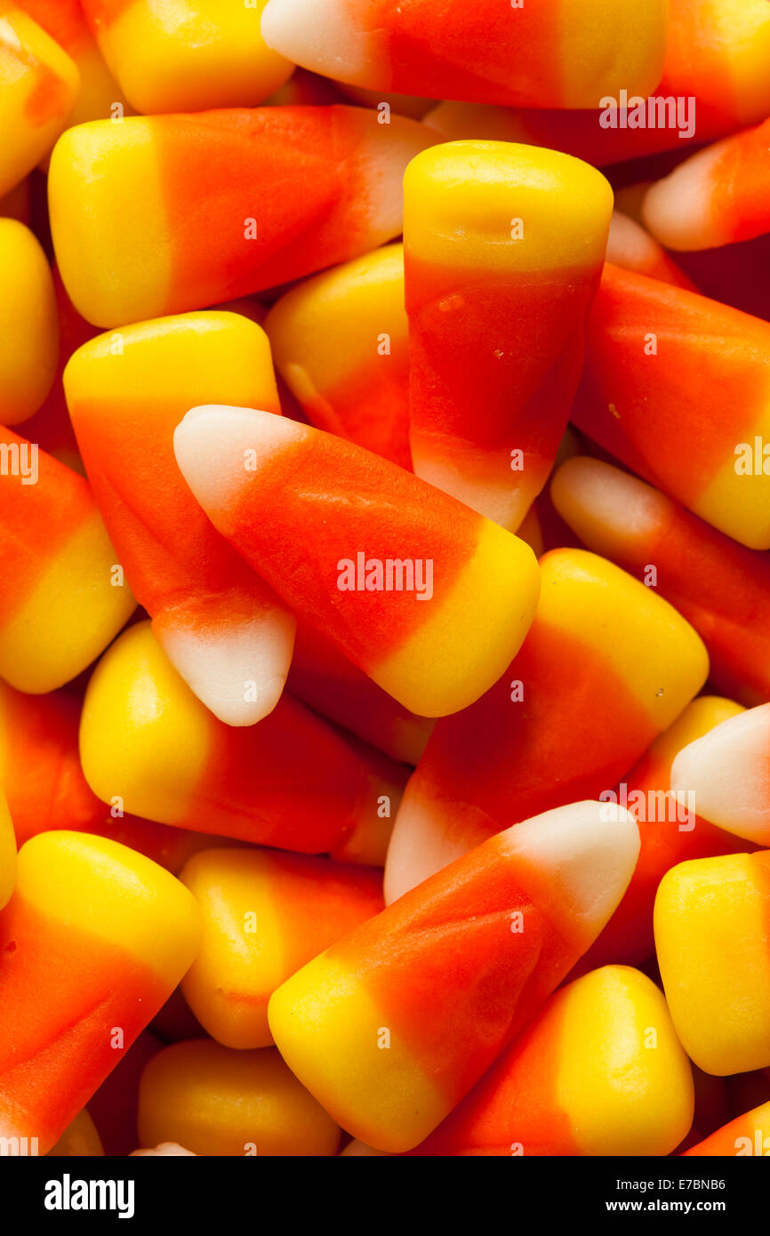 Colorful Candy Corn for Halloween on a Background Stock Photo - Alamy