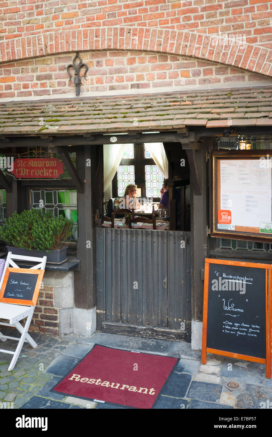 A couple having an intimate lunch by the window of a restaurant in ...