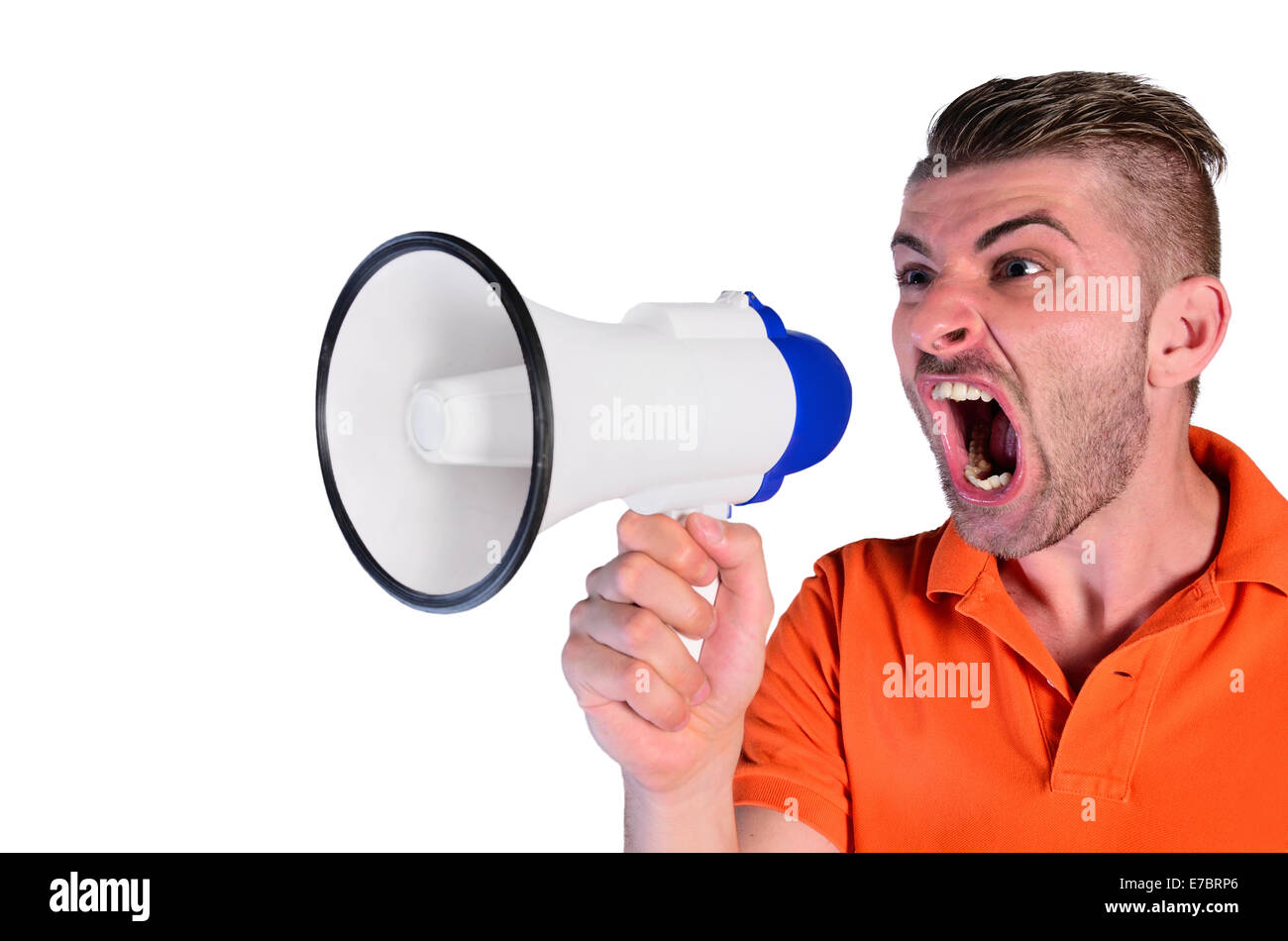 young man screaming aggressive at loudspeaker on white background Stock ...