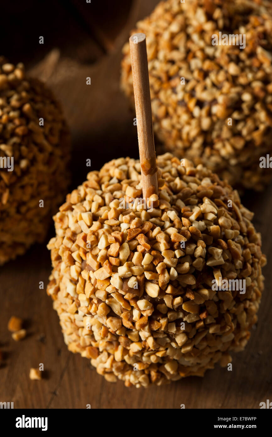 Red candy apples on a stick hi-res stock photography and images - Alamy
