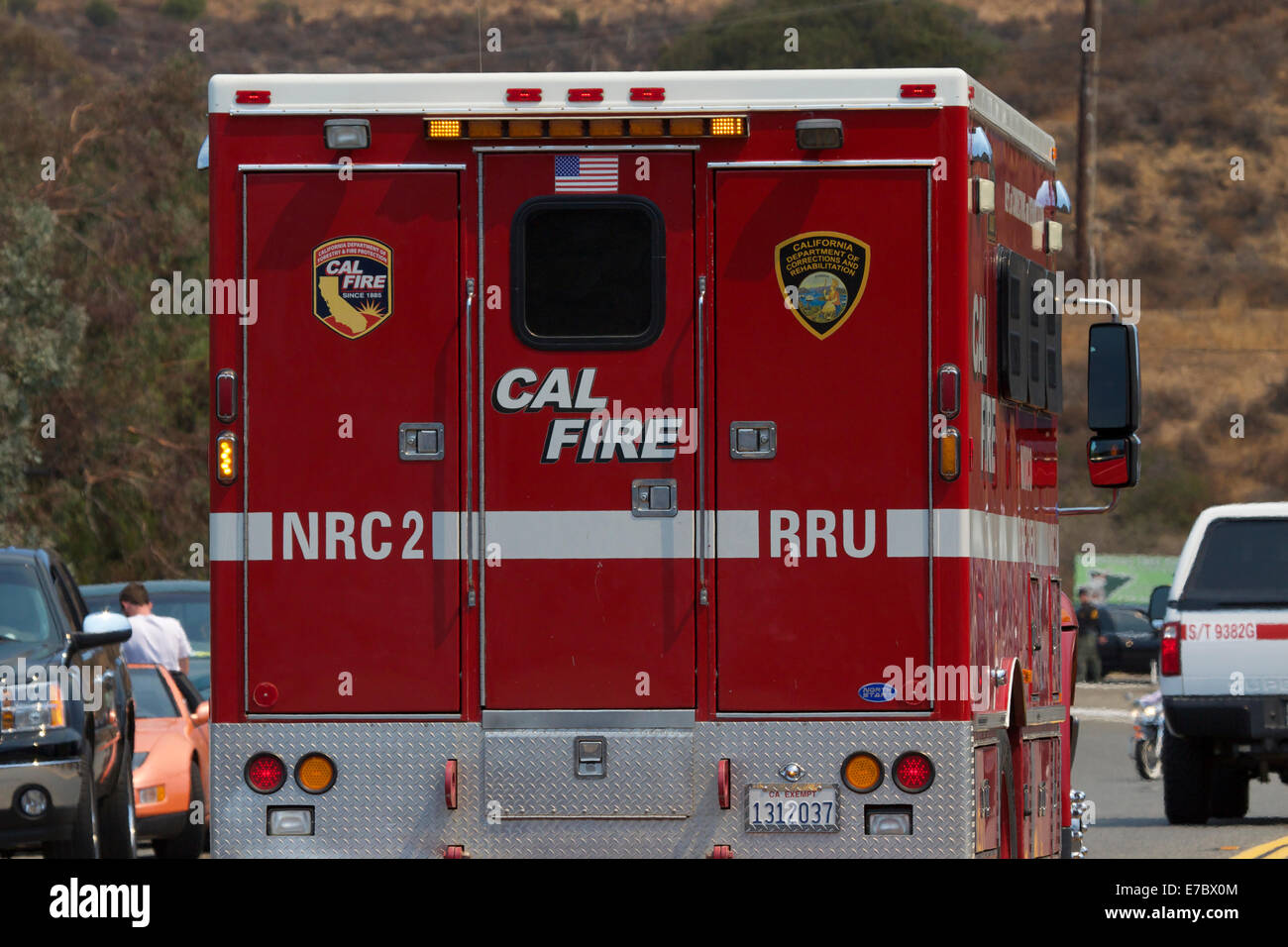 Fire fighters battled a brush fire Friday morning in Orange County's ...