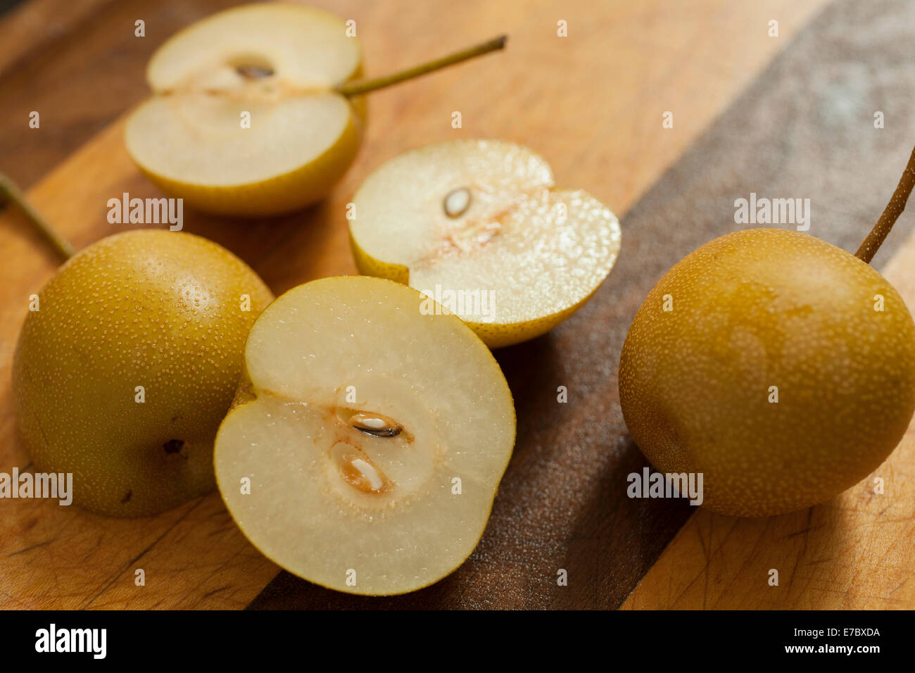 Small Asian Pears are cut open to show juicy interior Stock Photo - Alamy