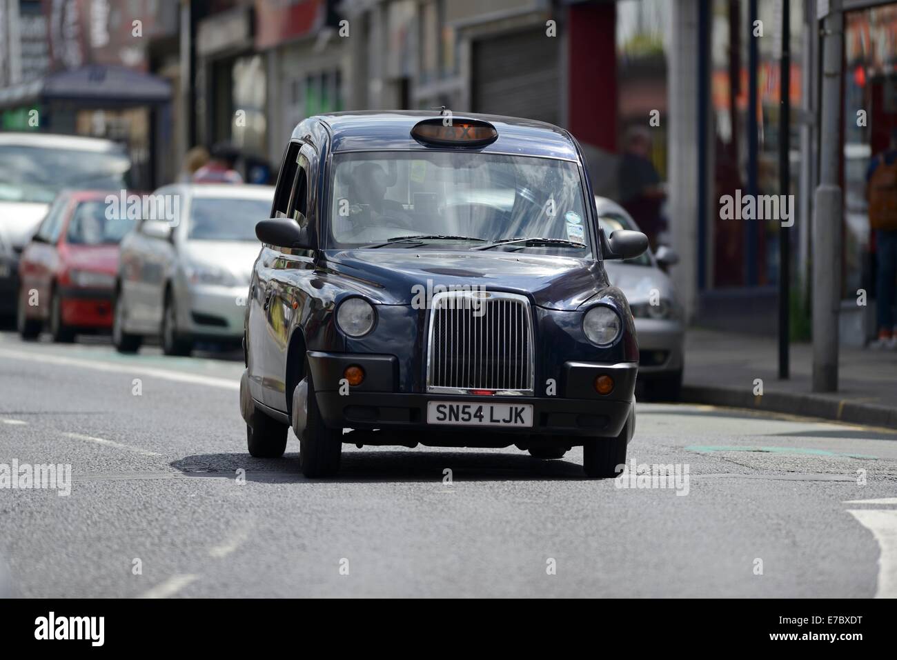 Black cab driving hi-res stock photography and images - Alamy