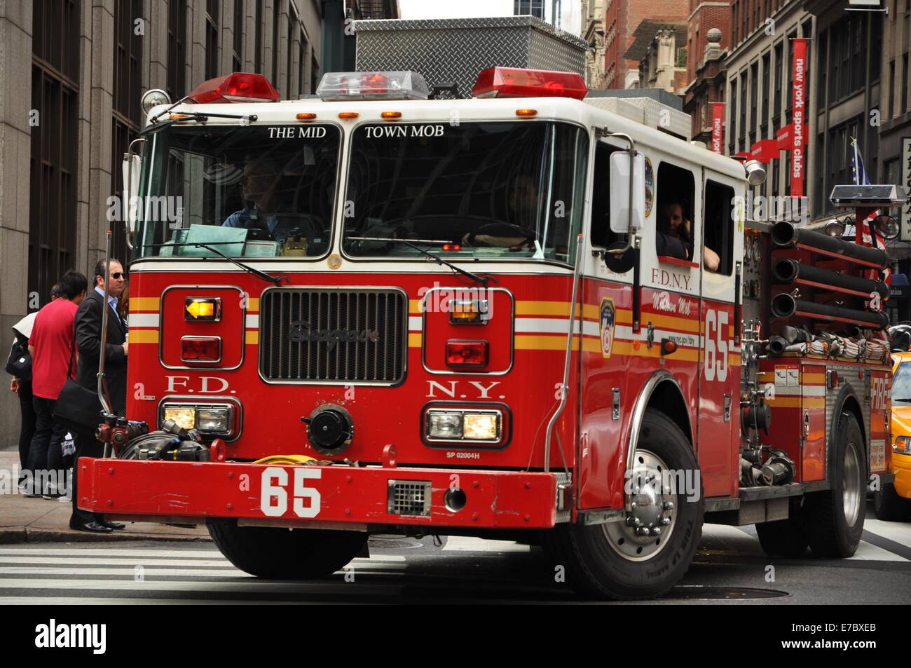 A fire engine turns a corner in Manhattan Stock Photo - Alamy