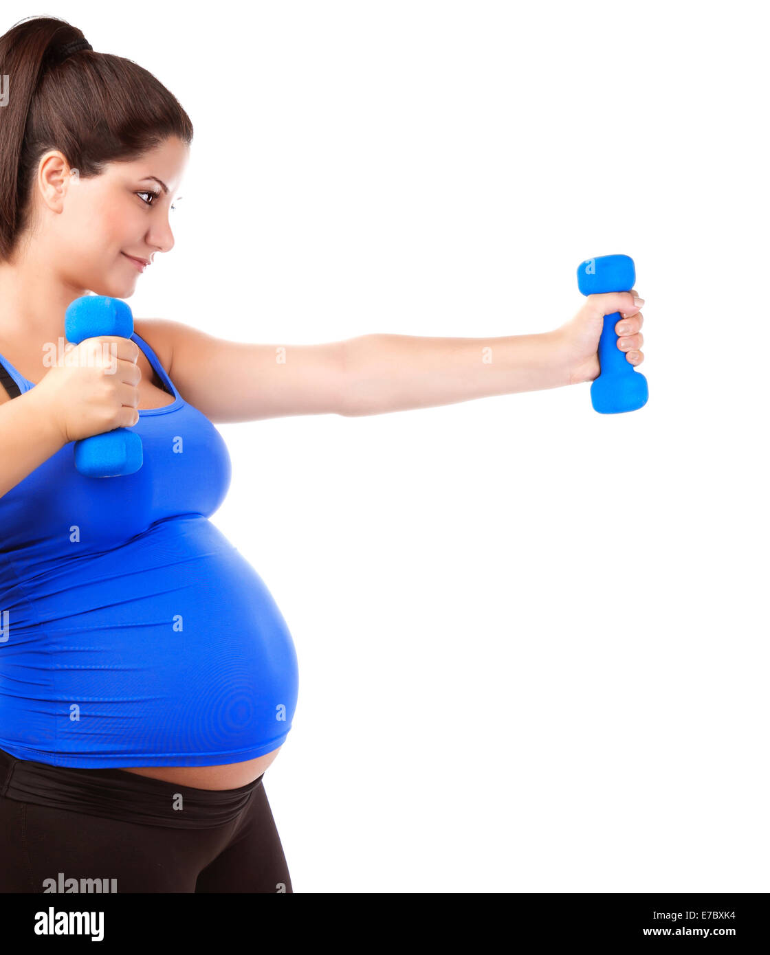 Active Expectant Female Pulling Dumbbells Isolated On White Background
