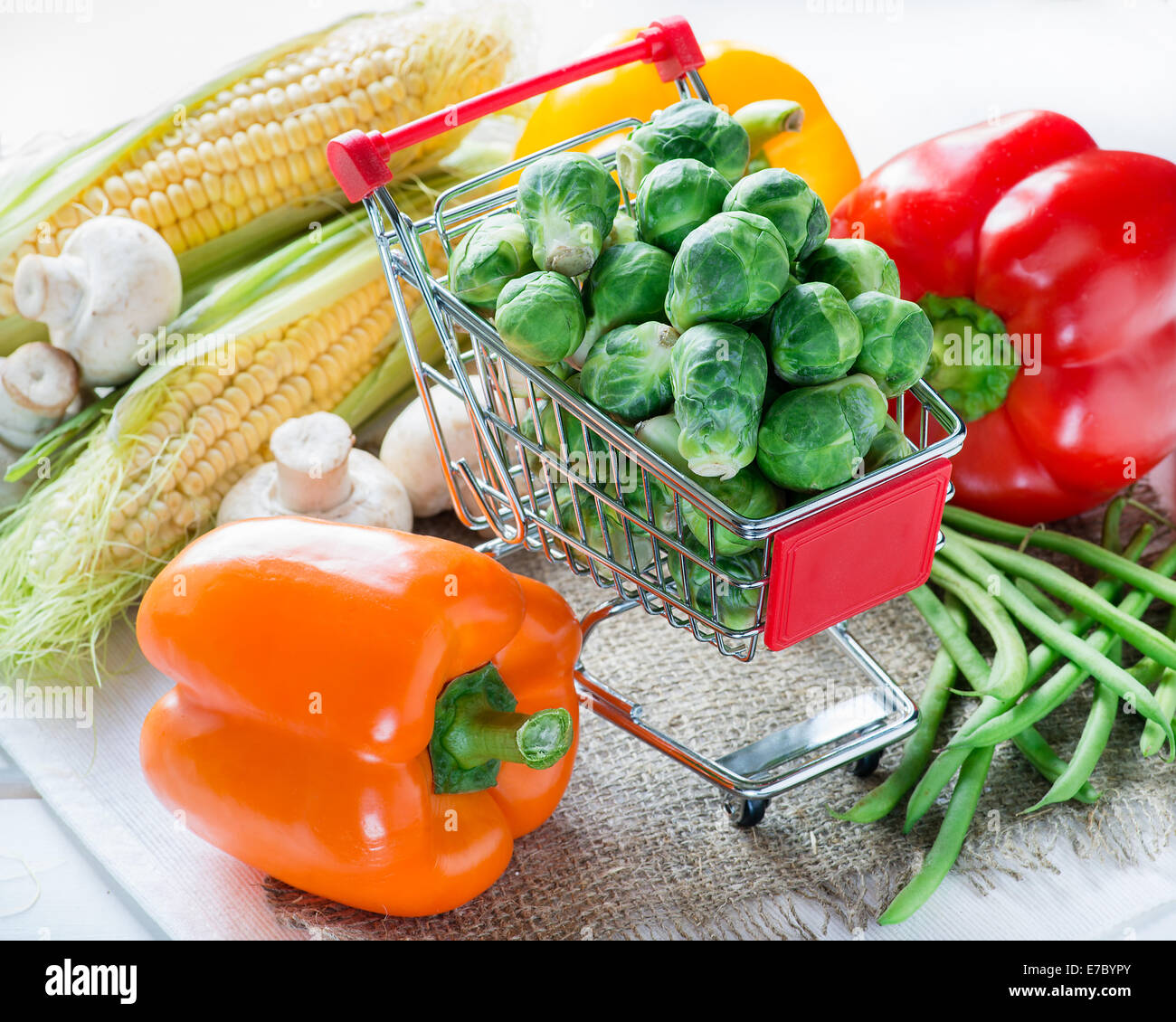 Fresh vegetables. Brussel sprouts, bell peppers and corn, selective ...