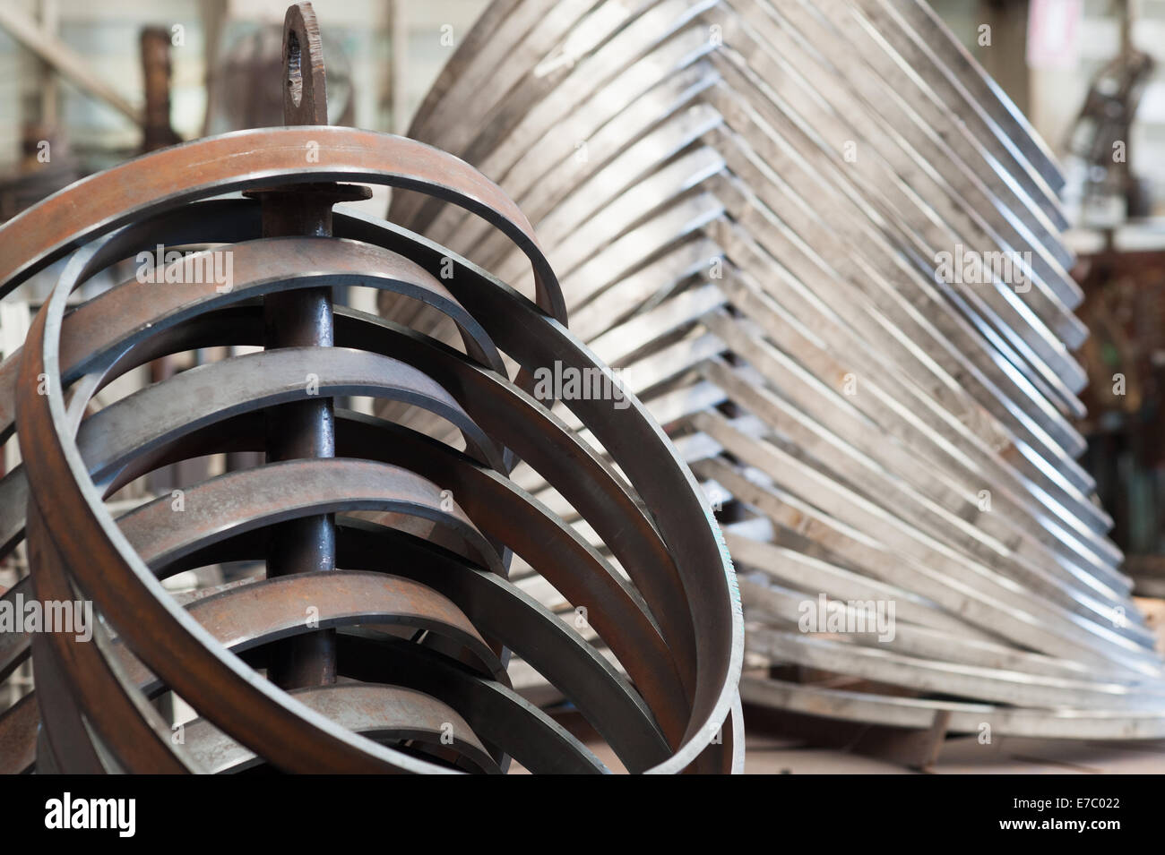 Conventional mild steel rings in the foreground and stainless steel ...
