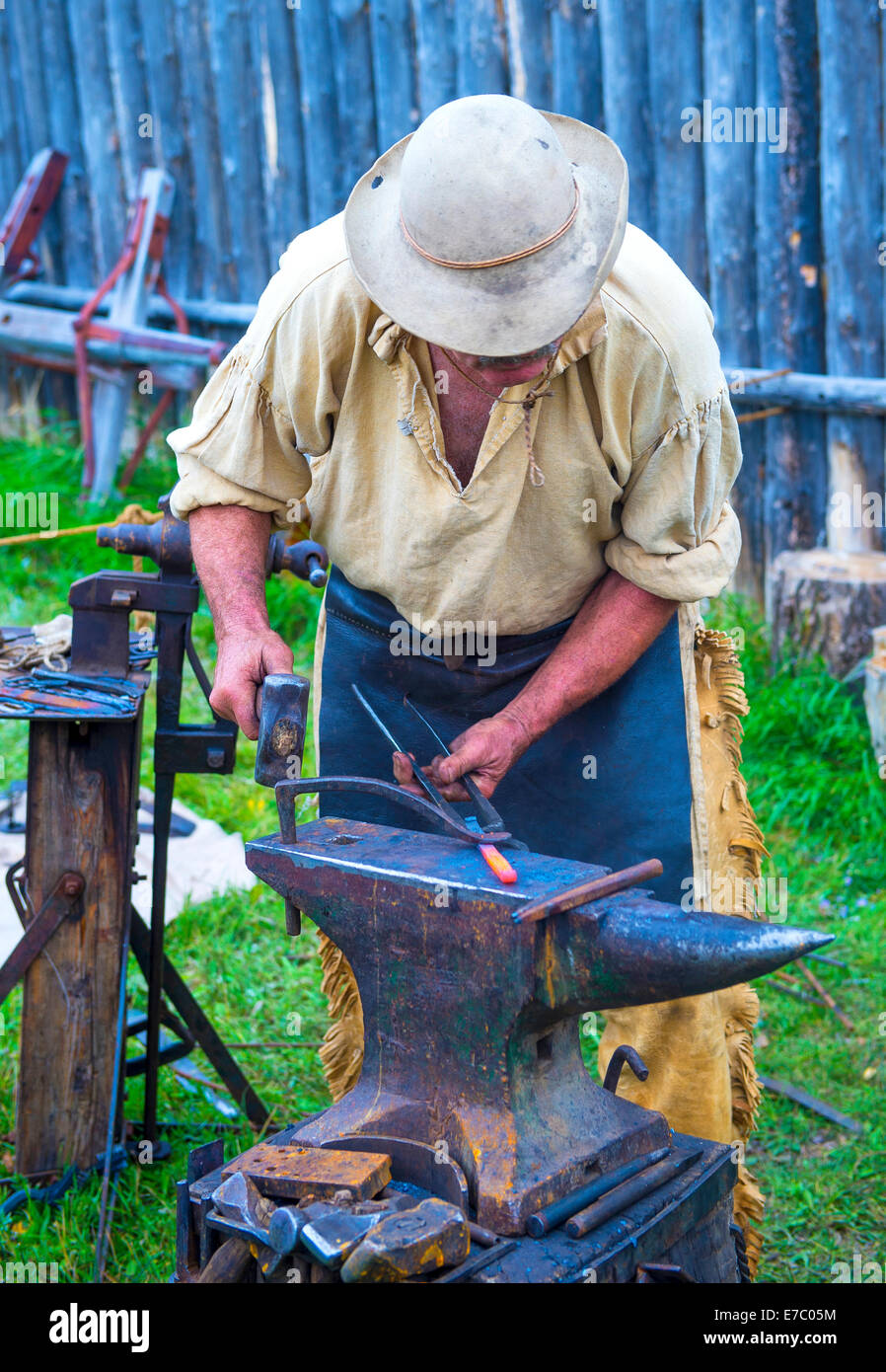 Blacksmithing demo during the Fort Bridger Rendezvous held in Fort Bridger Wyoming Stock Photo ...