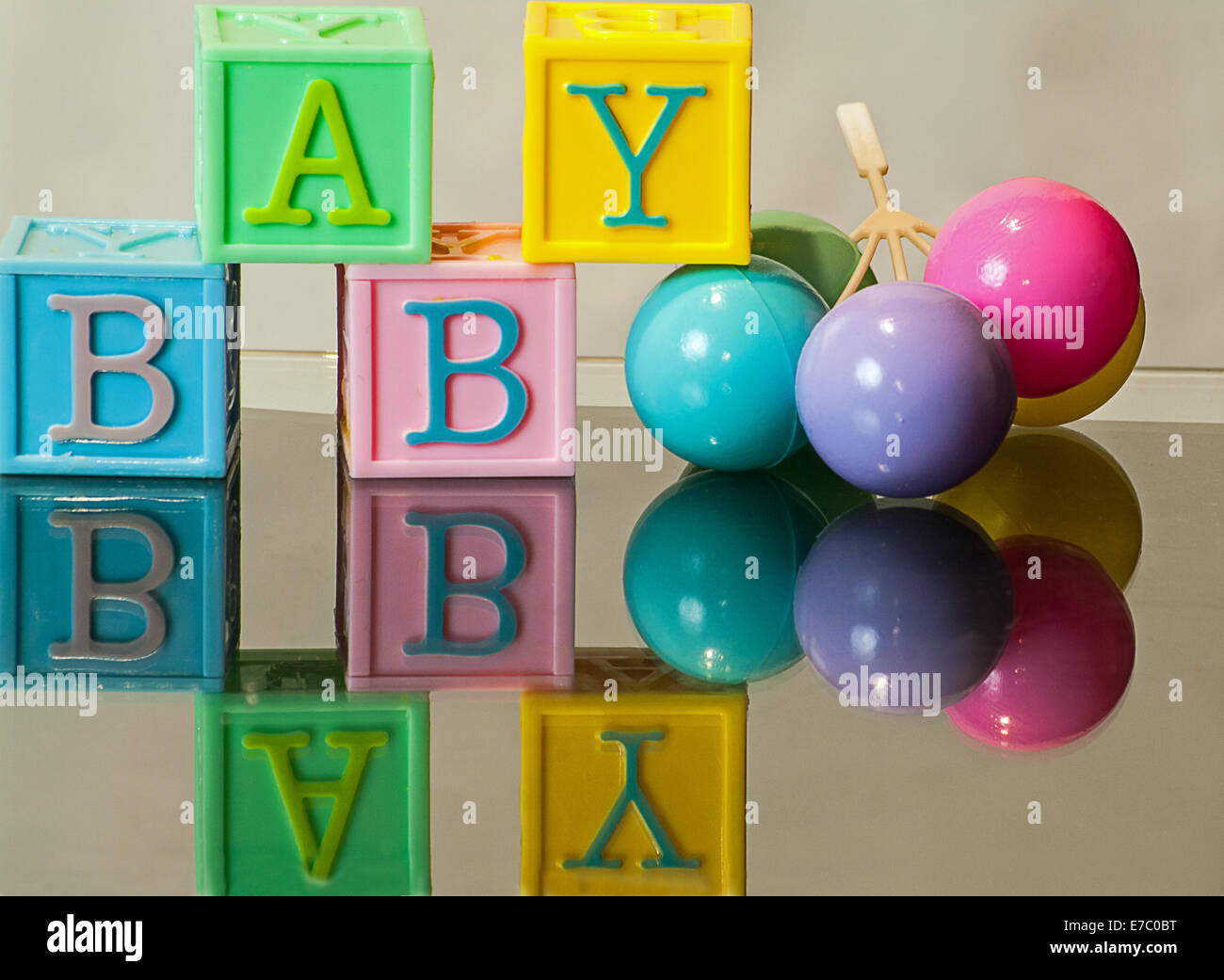 Baby in Blocks with plastic balloons Stock Photo - Alamy