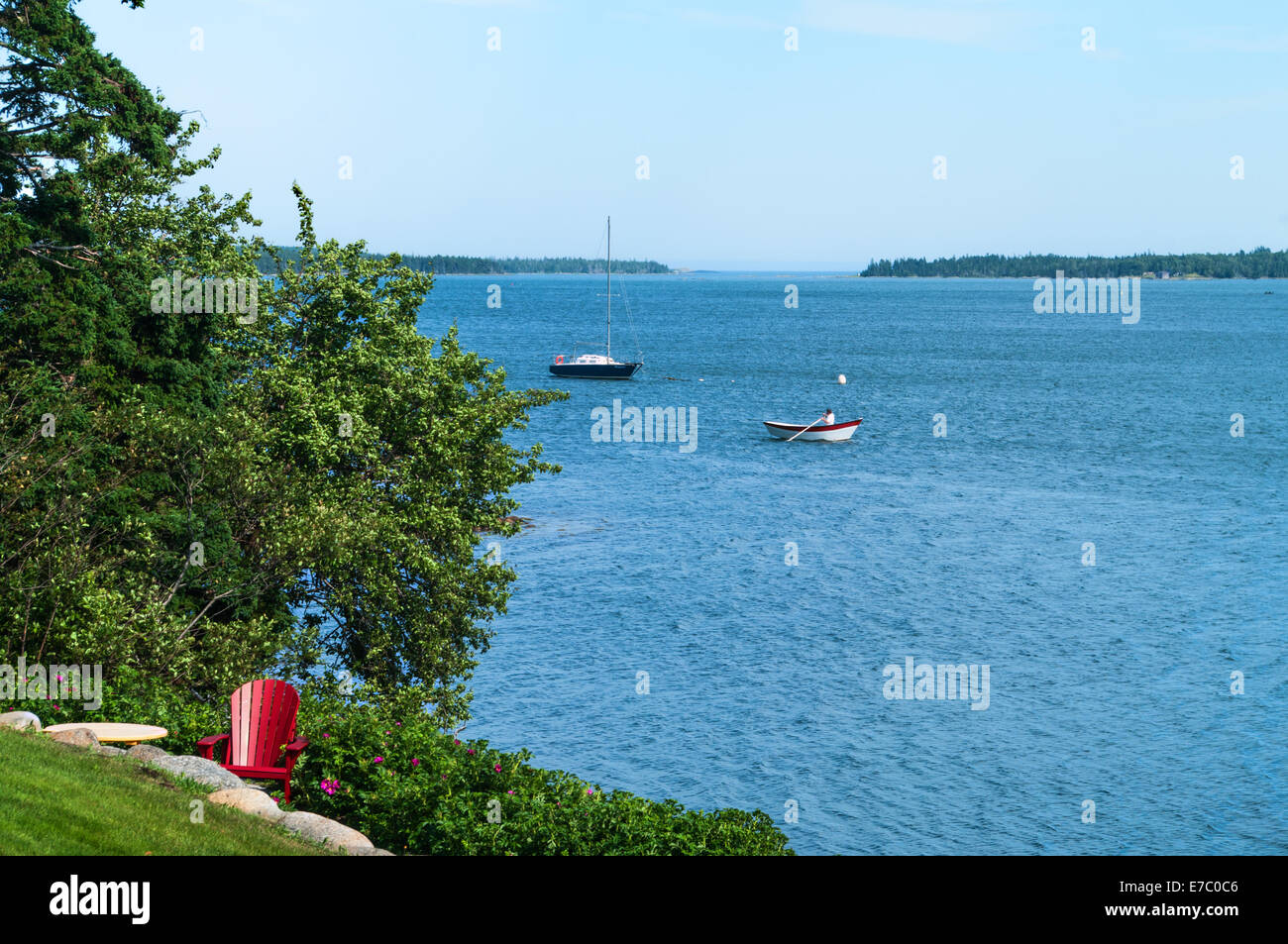 Sailor in a Dinghy in a bay off West Dublin Nova Scotia Stock Photo - Alamy